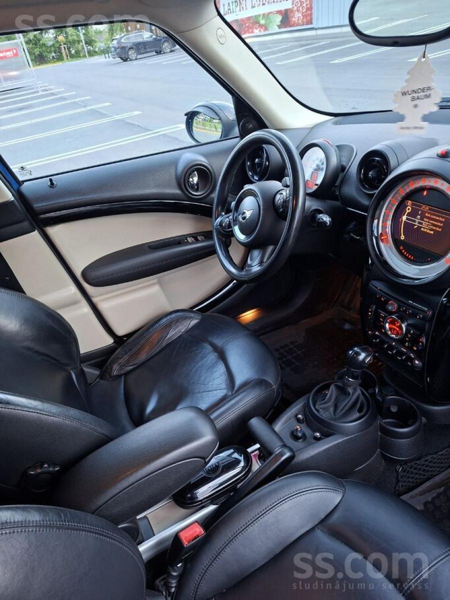 Blue MINI Countryman 2013 in Riga, with an engine capacity of 1.60 L and mileage of 245 thousand km for 6550 €, photo 8 on AUTOMOTO.COM.LV