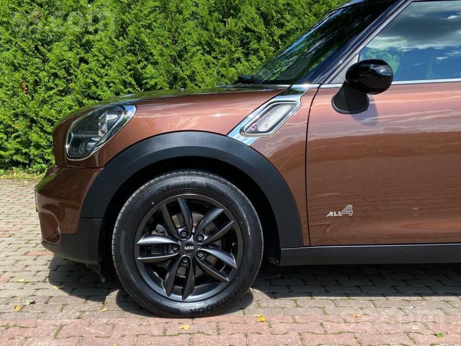 Brown MINI Countryman 2013 in Riga, with an engine capacity of 2.00 L and mileage of 220 thousand km for 9950 €, photo 4 on AUTOMOTO.COM.LV