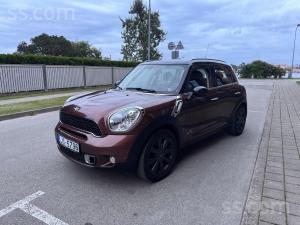 Brown MINI Countryman 2013 in Riga, with an engine capacity of 2.00 L and mileage of 121 thousand km for 9350 €, photo 8 on AUTOMOTO.COM.LV