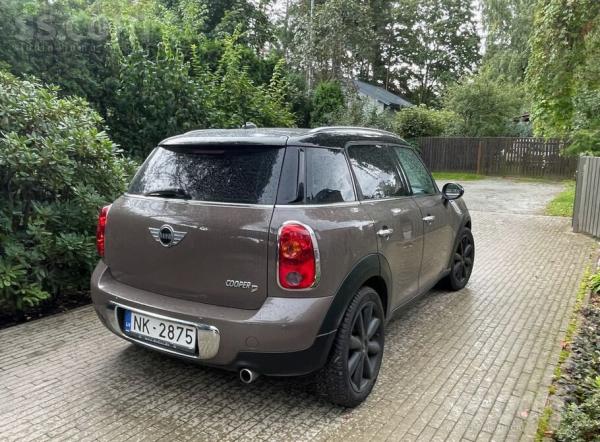 Brown MINI Countryman 2012 in Riga, with an engine capacity of 2.00 L and mileage of 199 thousand km for 7500 €, photo 3 on AUTOMOTO.COM.LV