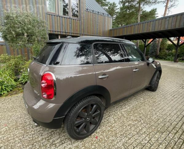 Brown MINI Countryman 2012 in Riga, with an engine capacity of 2.00 L and mileage of 199 thousand km for 7500 €, photo 10 on AUTOMOTO.COM.LV
