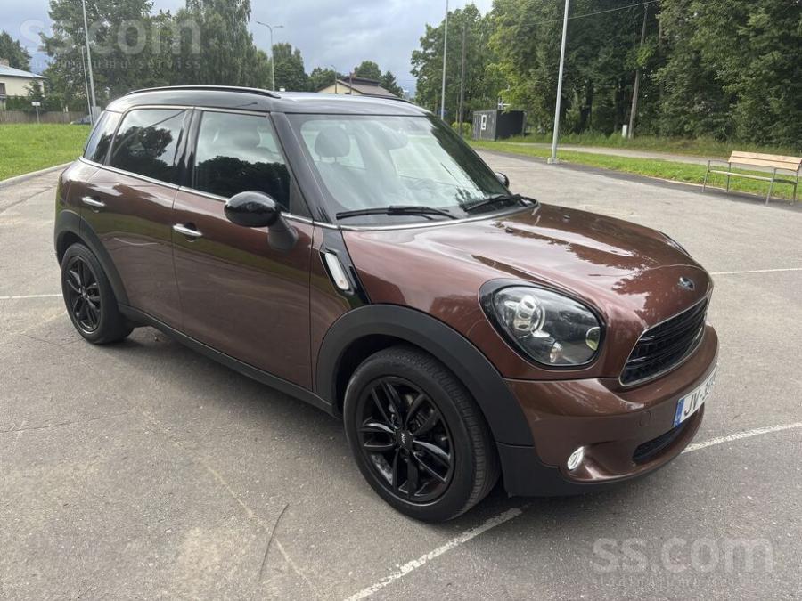 Brown MINI Countryman 2015 in Riga, with an engine capacity of 2.00 L and mileage of 93 thousand km for 9000 €, photo 1 on AUTOMOTO.COM.LV