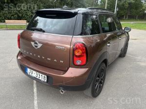 Brown MINI Countryman 2015 in Riga, with an engine capacity of 2.00 L and mileage of 93 thousand km for 9000 €, photo 4 on AUTOMOTO.COM.LV