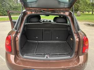 Brown MINI Countryman 2015 in Riga, with an engine capacity of 2.00 L and mileage of 93 thousand km for 9000 €, photo 10 on AUTOMOTO.COM.LV