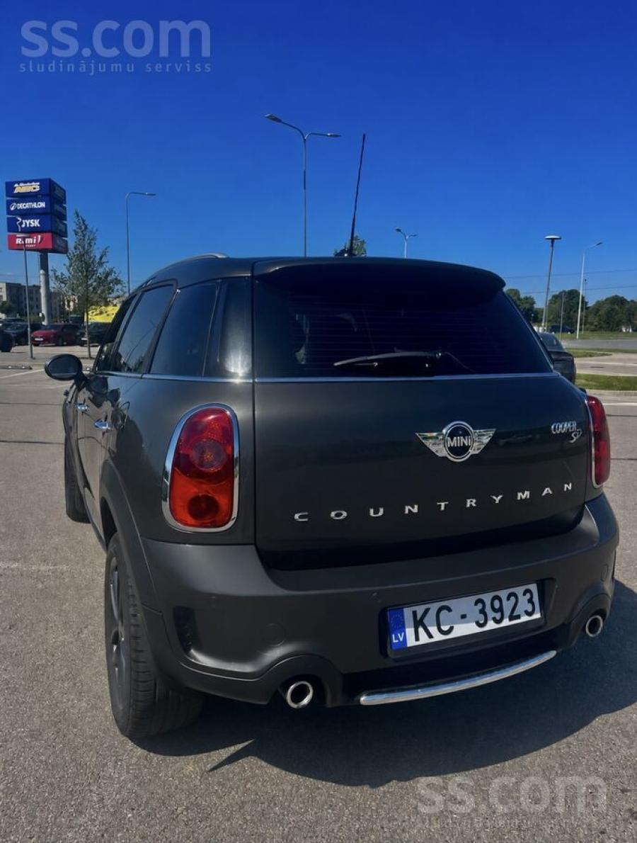 Green MINI Countryman 2013 in Riga, with an engine capacity of 2.00 L and mileage of 225 thousand km for 8500 €, photo 3 on AUTOMOTO.COM.LV