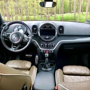 Green MINI Countryman 2018 in Riga, with an engine capacity of 2.00 L and mileage of 160 thousand km for 15800 €, photo 6 on AUTOMOTO.COM.LV