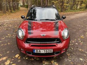 Red MINI Countryman 2016 in Riga, with an engine capacity of 2.00 L and mileage of 135 thousand km for 10500 €, photo 3 on AUTOMOTO.COM.LV