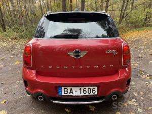 Red MINI Countryman 2016 in Riga, with an engine capacity of 2.00 L and mileage of 135 thousand km for 10500 €, photo 7 on AUTOMOTO.COM.LV