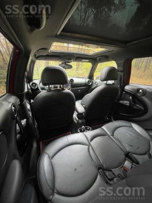 Red MINI Countryman 2016 in Riga, with an engine capacity of 2.00 L and mileage of 135 thousand km for 10500 €, photo 14 on AUTOMOTO.COM.LV