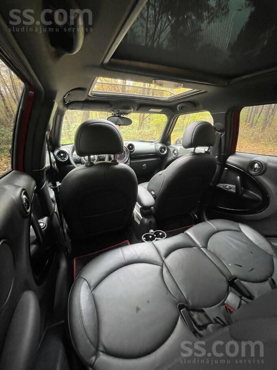 Red MINI Countryman 2016 in Riga, with an engine capacity of 2.00 L and mileage of 135 thousand km for 10500 €, photo 14 on AUTOMOTO.COM.LV