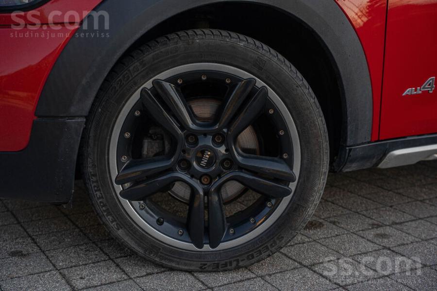 Red MINI Countryman 2016 in Riga, with an engine capacity of 2.00 L and mileage of 266 thousand km for 9650 €, photo 4 on AUTOMOTO.COM.LV