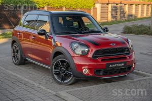 Red MINI Countryman 2016 in Riga, with an engine capacity of 2.00 L and mileage of 266 thousand km for 9650 €, photo 11 on AUTOMOTO.COM.LV