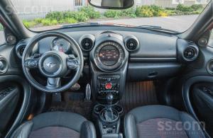 Red MINI Countryman 2016 in Riga, with an engine capacity of 2.00 L and mileage of 266 thousand km for 9650 €, photo 13 on AUTOMOTO.COM.LV
