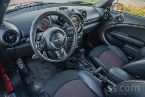 Red MINI Countryman 2016 in Riga, with an engine capacity of 2.00 L and mileage of 266 thousand km for 9650 €, photo 18 on AUTOMOTO.COM.LV