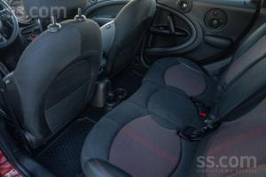 Red MINI Countryman 2016 in Riga, with an engine capacity of 2.00 L and mileage of 266 thousand km for 9650 €, photo 28 on AUTOMOTO.COM.LV