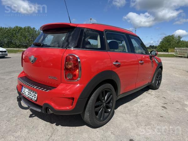 Red MINI Countryman 2010 in Talsi, with an engine capacity of 1.60 L and mileage of 202 thousand km for 5800 €, photo 5 on AUTOMOTO.COM.LV