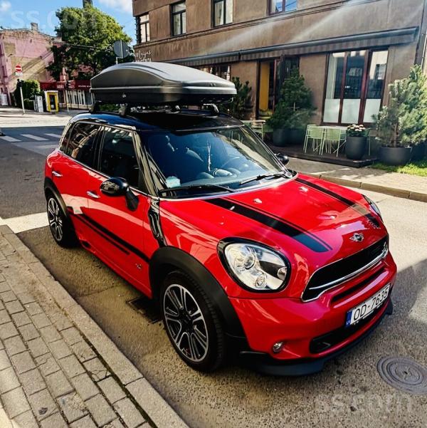 Red MINI Countryman 2015 in Riga, with an engine capacity of 2.00 L and mileage of 195 thousand km for 9650 €, photo 1 on AUTOMOTO.COM.LV