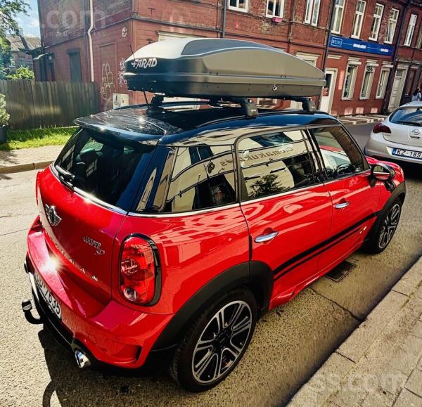 Red MINI Countryman 2015 in Riga, with an engine capacity of 2.00 L and mileage of 195 thousand km for 9650 €, photo 3 on AUTOMOTO.COM.LV