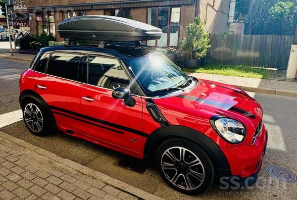 Red MINI Countryman 2015 in Riga, with an engine capacity of 2.00 L and mileage of 195 thousand km for 9650 €, photo 5 on AUTOMOTO.COM.LV