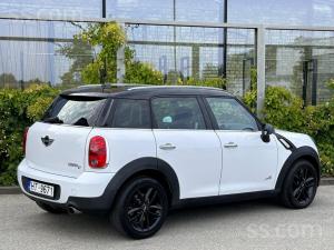 White MINI Countryman 2011 in Riga, with an engine capacity of 2.00 L and mileage of 239 thousand km for 5750 €, photo 12 on AUTOMOTO.COM.LV