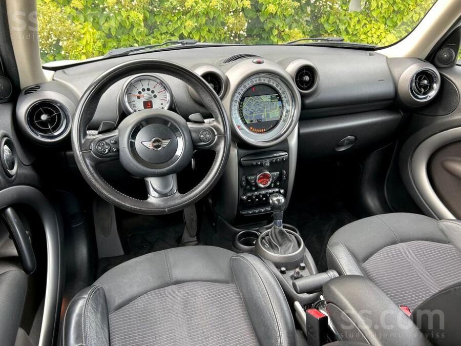 White MINI Countryman 2011 in Riga, with an engine capacity of 2.00 L and mileage of 239 thousand km for 5750 €, photo 14 on AUTOMOTO.COM.LV