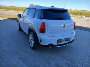 White MINI Countryman 2013 in Marijampole, with an engine capacity of 2.00 L and mileage of 132 thousand km for 8750 €, photo 12 on AUTOMOTO.COM.LV