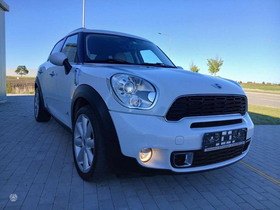 White MINI Countryman 2013 in Marijampole, with an engine capacity of 2.00 L and mileage of 132 thousand km for 8750 €, photo 15 on AUTOMOTO.COM.LV