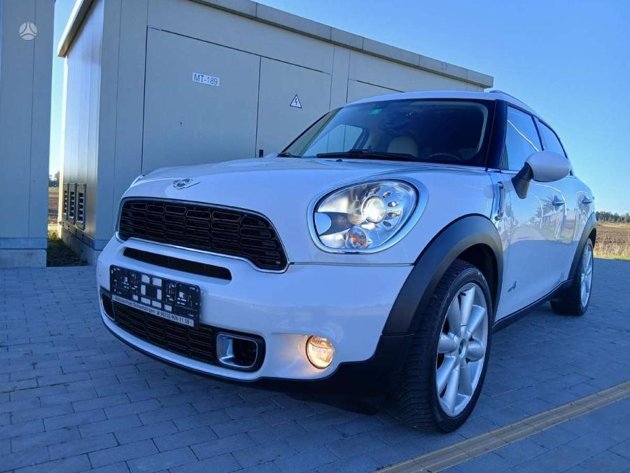 White MINI Countryman 2013 in Marijampole, with an engine capacity of 2.00 L and mileage of 132 thousand km for 8750 €, photo 16 on AUTOMOTO.COM.LV