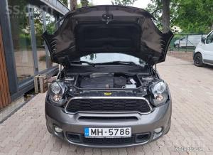 White MINI Countryman 2013 in Riga, with an engine capacity of 2.00 L and mileage of 0 thousand km for 6900 €, photo 21 on AUTOMOTO.COM.LV