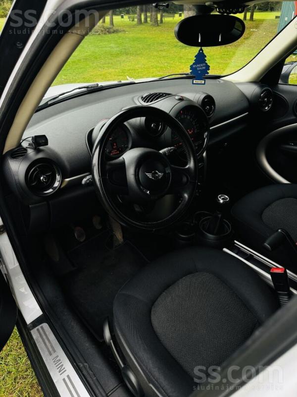 White MINI Countryman 2014 in Riga, with an engine capacity of 1.60 L and mileage of 182 thousand km for 5199 €, photo 7 on AUTOMOTO.COM.LV