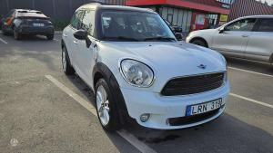 White MINI Countryman 2015 in Vilnius, with an engine capacity of 1.60 L and mileage of 215 thousand km for 4999 €, photo 1 on AUTOMOTO.COM.LV