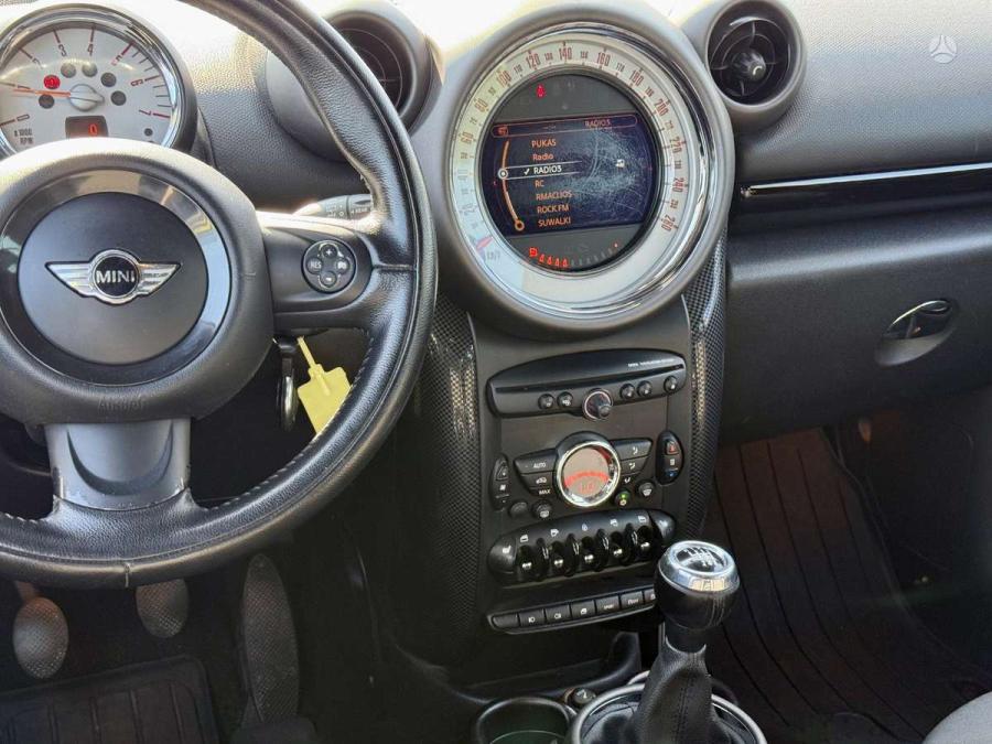 Yellow MINI Countryman 2012 in Marijampole, with an engine capacity of 1.60 L and mileage of 233 thousand km for 4400 €, photo 16 on AUTOMOTO.COM.LV