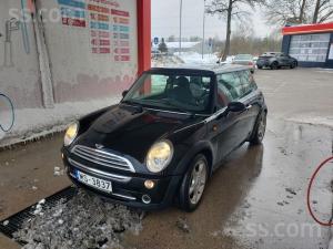 Black MINI One 2005 in Riga, with an engine capacity of 1.60 L and mileage of 210 thousand km for 900 €, photo  on AUTOMOTO.COM.LV