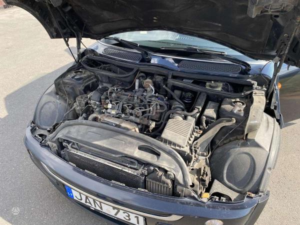 Black MINI One 2006 in Vilnius, with an engine capacity of 1.40 L and mileage of 250 thousand km for 1500 €, photo 9 on AUTOMOTO.COM.LV