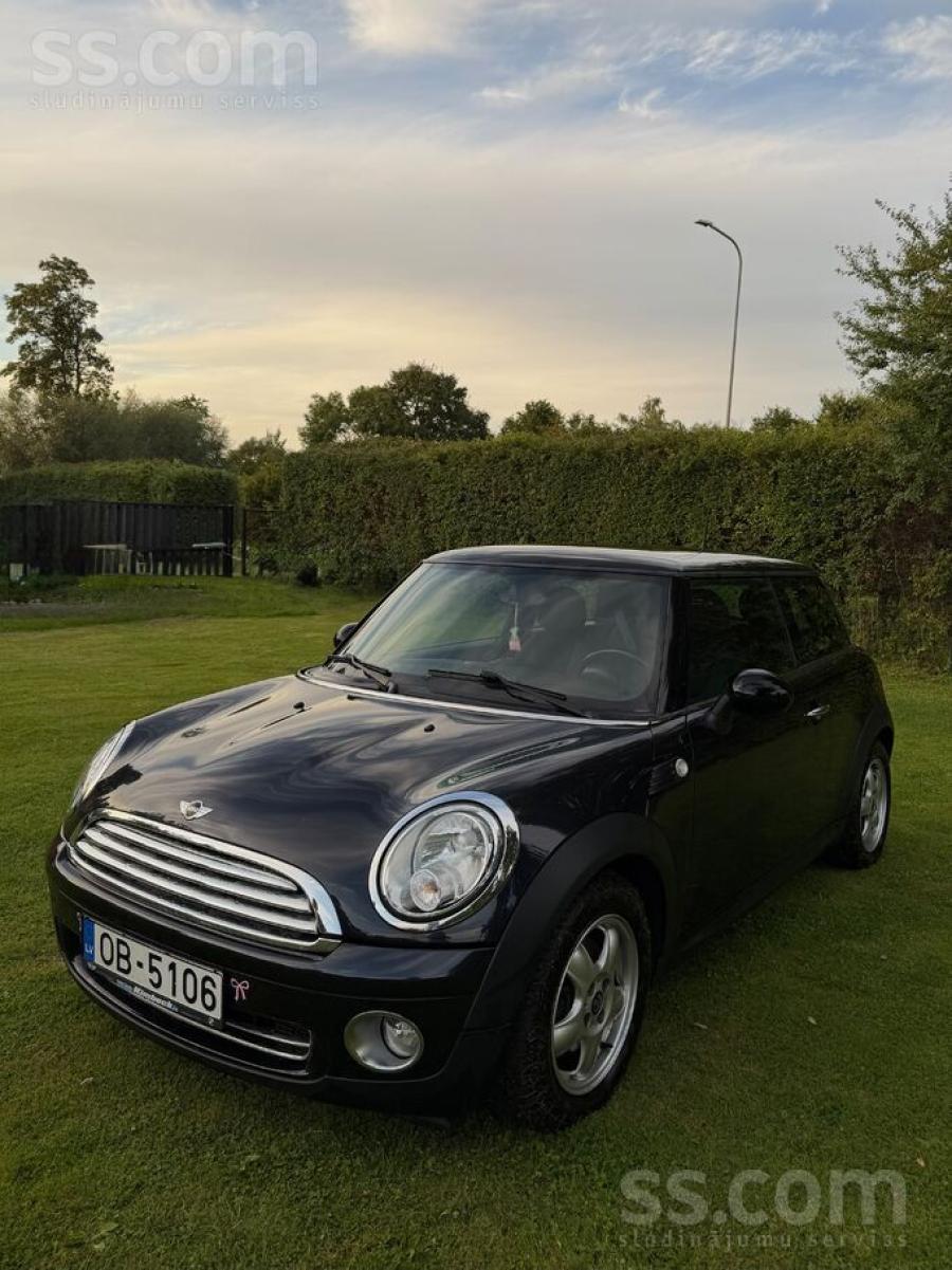 Black MINI One 2009 in Riga, with an engine capacity of 1.40 L and mileage of 122 thousand km for 3000 €, photo 1 on AUTOMOTO.COM.LV