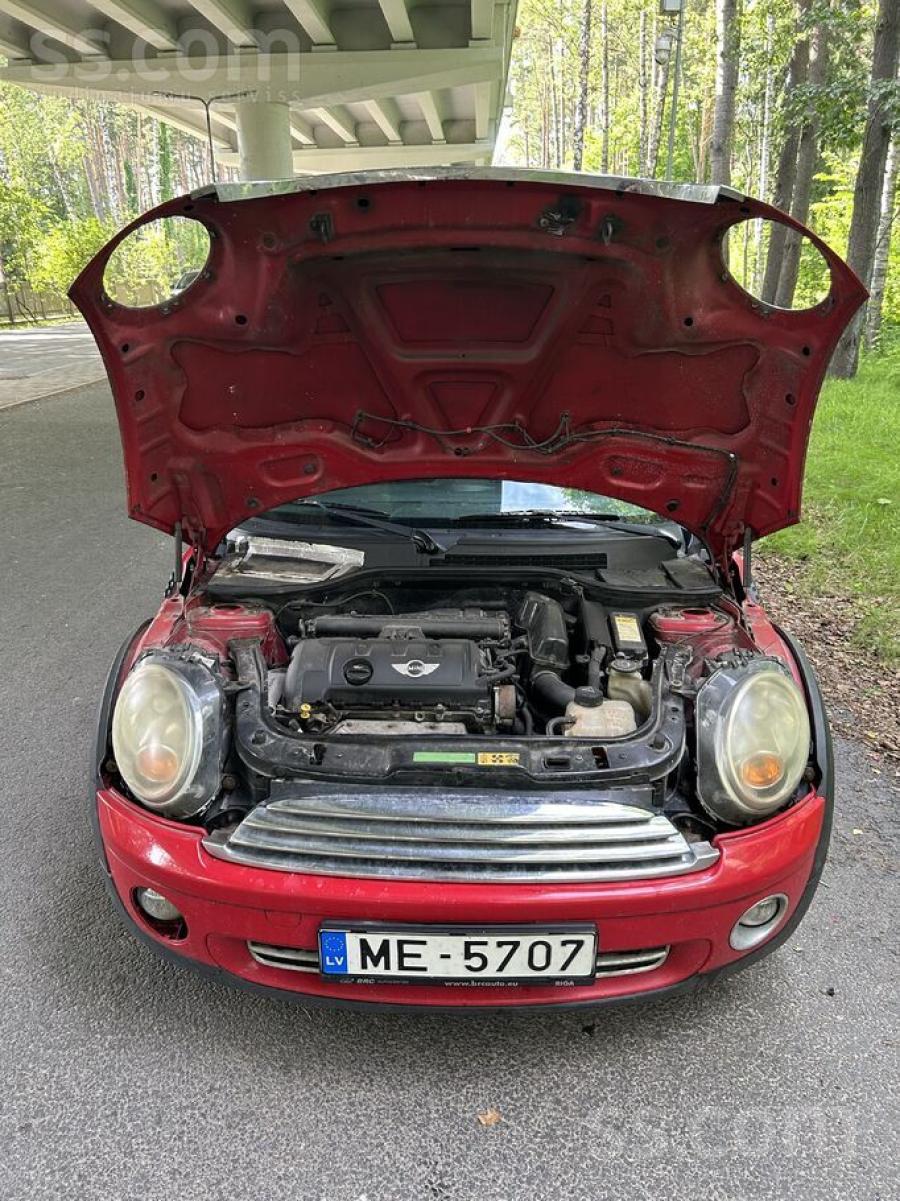 Red MINI One 2007 in Riga, with an engine capacity of 1.40 L and mileage of 197 thousand km for 2000 €, photo 11 on AUTOMOTO.COM.LV