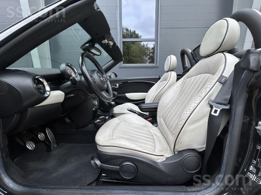Black MINI Roadster 2012 in Talsi, with an engine capacity of 1.60 L and mileage of 137 thousand km for 7990 €, photo 8 on AUTOMOTO.COM.LV