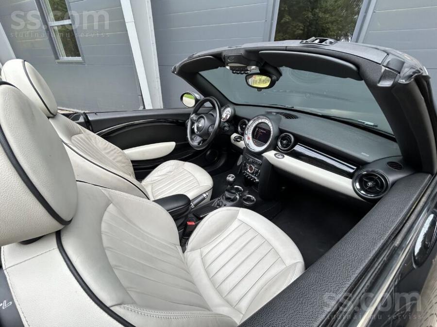 Black MINI Roadster 2012 in Talsi, with an engine capacity of 1.60 L and mileage of 137 thousand km for 7990 €, photo 11 on AUTOMOTO.COM.LV