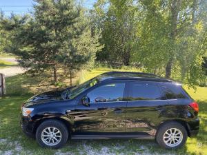 Melns Mitsubishi ASX 2010 Viļņa, ar dzinēja tilpumu 1.59 L un nobraukumu 230 tūkst. km par 3500 €, foto  vietnē AUTOMOTO.COM.LV