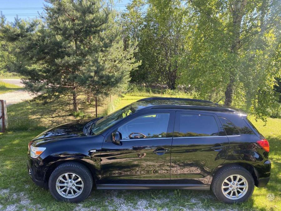 Black Mitsubishi ASX 2010 in Vilnius, with an engine capacity of 1.59 L and mileage of 230 thousand km for 3500 €, photo 1 on AUTOMOTO.COM.LV