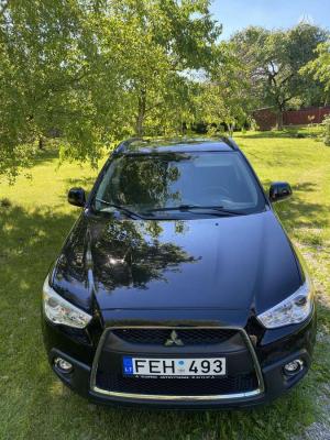 Black Mitsubishi ASX 2010 in Vilnius, with an engine capacity of 1.59 L and mileage of 230 thousand km for 3500 €, photo 4 on AUTOMOTO.COM.LV