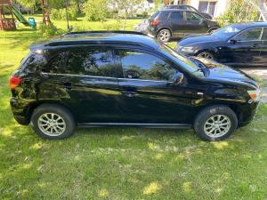 Black Mitsubishi ASX 2010 in Vilnius, with an engine capacity of 1.59 L and mileage of 230 thousand km for 3500 €, photo 6 on AUTOMOTO.COM.LV