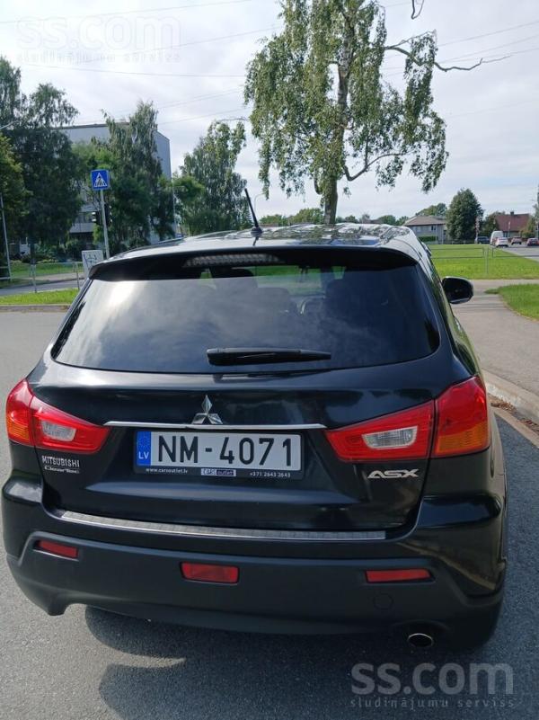 Melns Mitsubishi ASX 2010 Rīga, ar dzinēja tilpumu 1.80 L un nobraukumu 176 tūkst. km par 4000 €, foto 2 vietnē AUTOMOTO.COM.LV