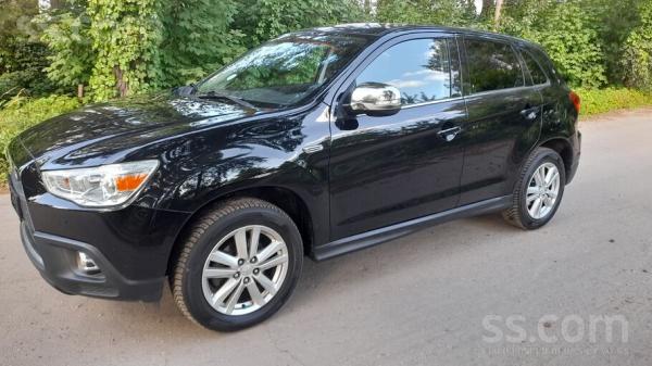 Black Mitsubishi ASX 2010 in Riga, with an engine capacity of 1.80 L and mileage of 251 thousand km for 4800 €, photo 5 on AUTOMOTO.COM.LV