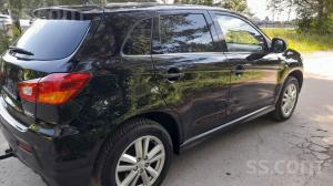 Black Mitsubishi ASX 2010 in Riga, with an engine capacity of 1.80 L and mileage of 251 thousand km for 4800 €, photo 12 on AUTOMOTO.COM.LV