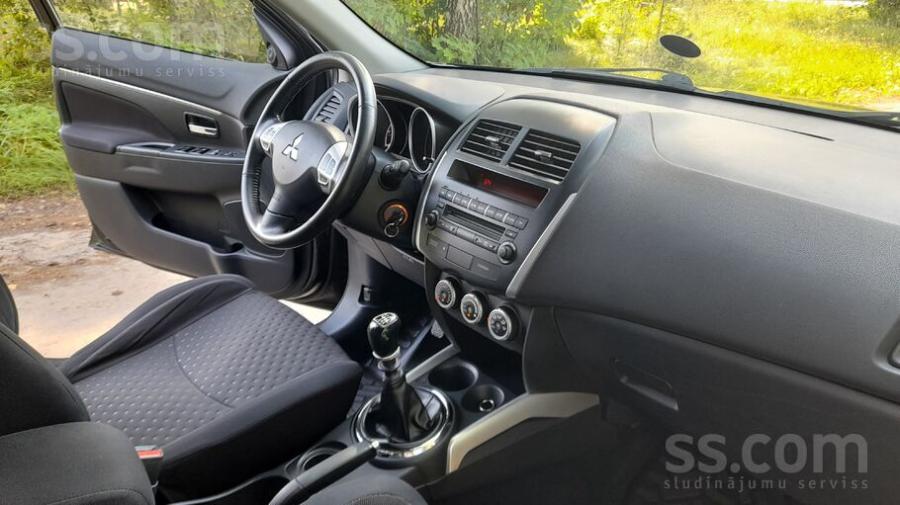 Black Mitsubishi ASX 2010 in Riga, with an engine capacity of 1.80 L and mileage of 251 thousand km for 4800 €, photo 18 on AUTOMOTO.COM.LV