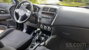 Black Mitsubishi ASX 2010 in Riga, with an engine capacity of 1.80 L and mileage of 251 thousand km for 4800 €, photo 22 on AUTOMOTO.COM.LV