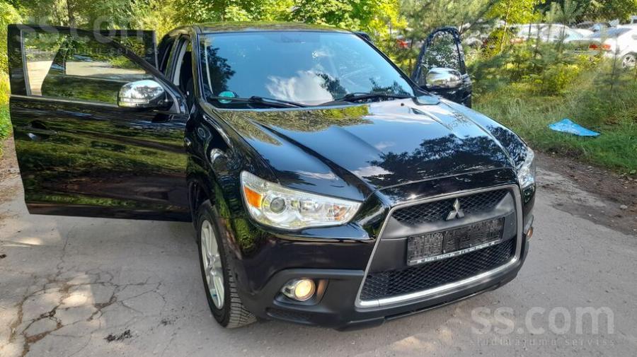 Black Mitsubishi ASX 2010 in Riga, with an engine capacity of 1.80 L and mileage of 251 thousand km for 4800 €, photo 28 on AUTOMOTO.COM.LV