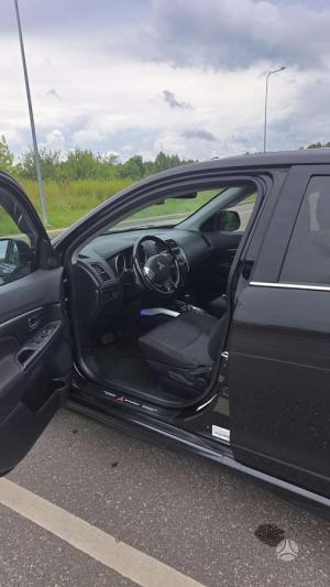 Melns Mitsubishi ASX 2011 Viļņa, ar dzinēja tilpumu 2.00 L un nobraukumu 188 tūkst. km par 5800 €, foto 8 vietnē AUTOMOTO.COM.LV