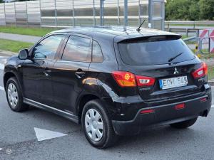 Black Mitsubishi ASX 2011 in Radviliskis, with an engine capacity of 1.59 L and mileage of 332 thousand km for 1750 €, photo 4 on AUTOMOTO.COM.LV